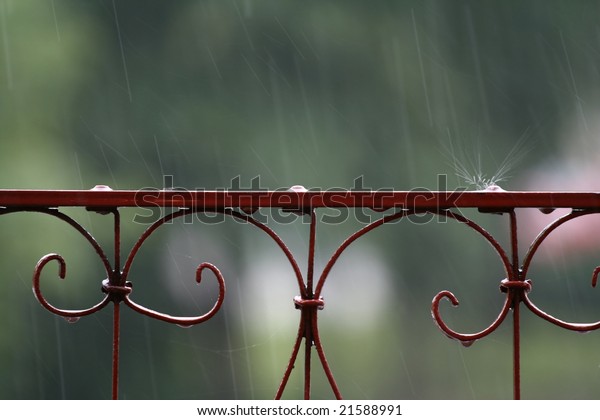 Raindrops Falling On Railing Stock Photo 21588991 | Shutterstock