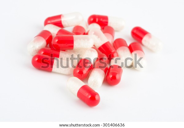Red Capsules Stock Photo (Edit Now) 301406636