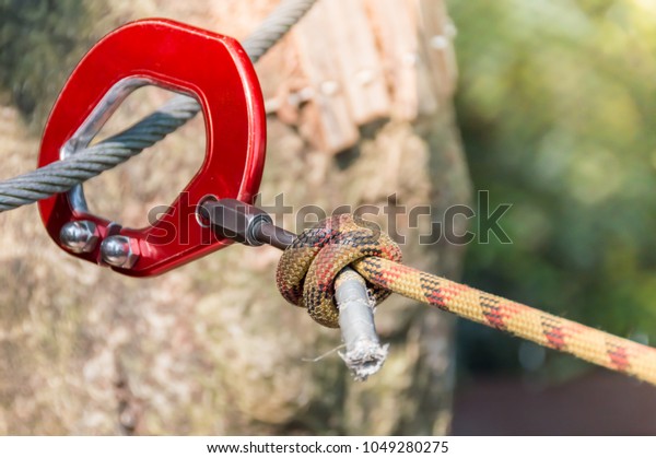 Red iron loop Strapped with wire rope, a safety device for tourist Use ...