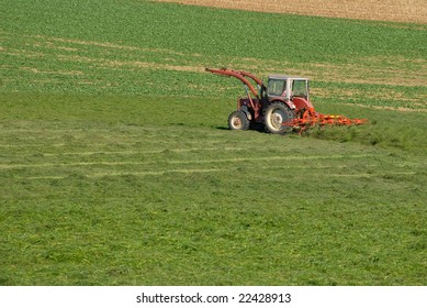 Tractor Topping Grass Field Stock Photo (Edit Now) 1015776172