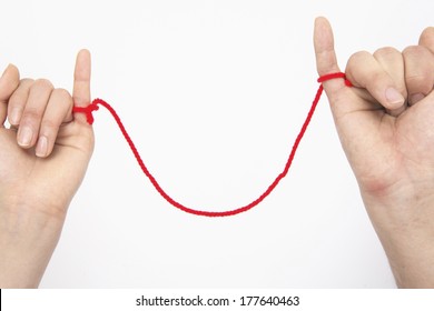 Red Wool Thread Between 2 Fingers Stock Photo (Edit Now) 177640463