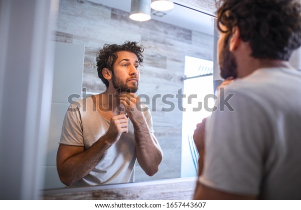 Reflection Handsome Man Beard Looking Mirror Stock Photo 1657443607 ...