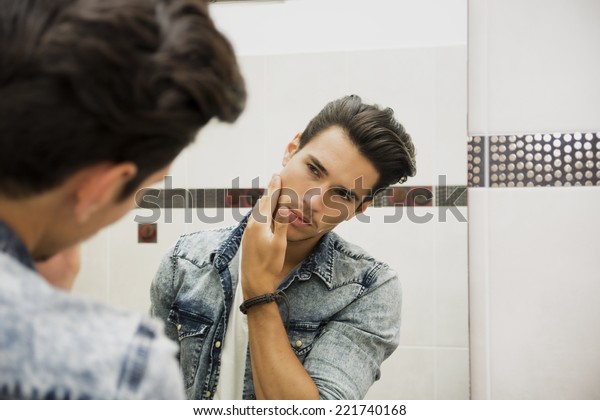 Reflection Mirror Man Touching Face Examining Stock Photo 221740168 ...