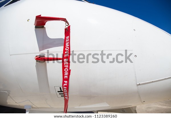 remove before flight flag cover pitot static tube of white aircraft at ...