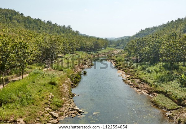 River Between Two Hills Stock Photo (Edit Now) 1122554054