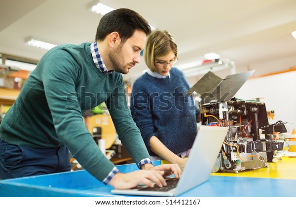 Robotics Engineer Students Teamwork On Project Stock Photo 514412167 ...
