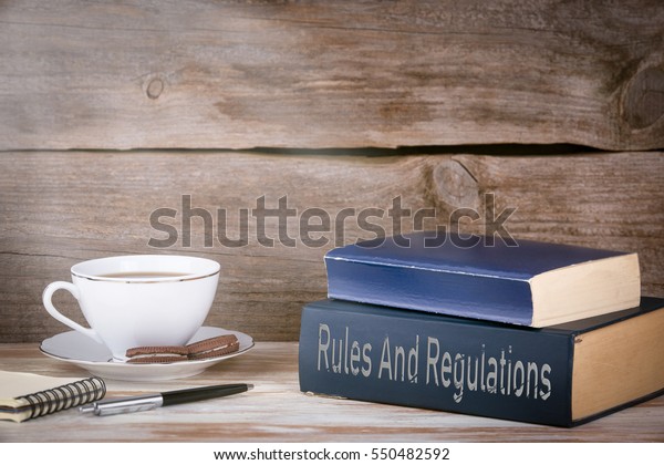 Rules Regulations Stack Books On Wooden Stock Photo (Edit Now) 550482592