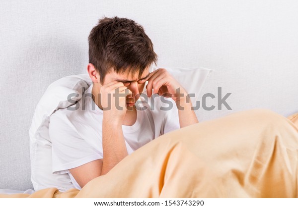 Sad Young Man Crying Bed By Stock Photo 1543743290 | Shutterstock
