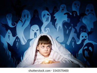 Scared Boy Flashlight Hiding Under Blanket Stock Photo 1543570400 ...