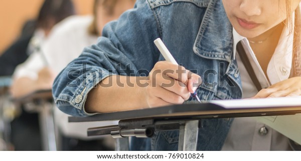 School Students Taking Exam Thinking Hard Stock Photo (Edit Now) 769010824