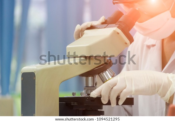 3,987 People Looking Through Microscope Images, Stock Photos & Vectors ...