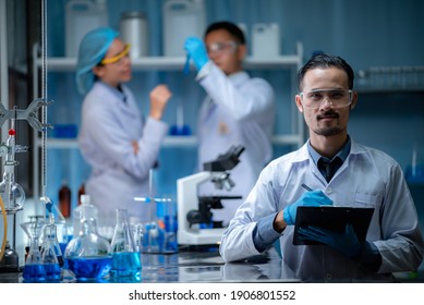 Scientists Recording Data Analyzing Laboratory Study Stock Photo ...