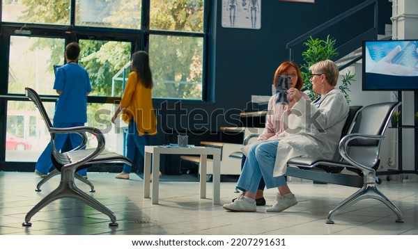 Senior Medic Explaining X Ray Scan Stock Photo 2207291631 | Shutterstock