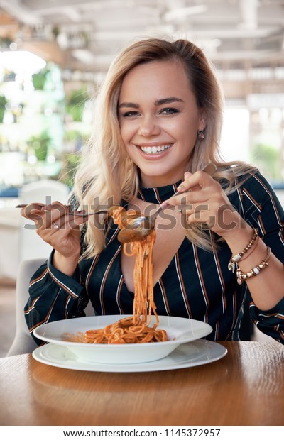 Sensual Woman Rolling Spaghetti And Keeping On A Fork To Eat Beautiful