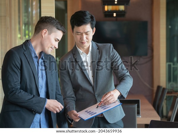 Serious Asian Worker Explaining Visual Template Stock Photo 2043659936 ...