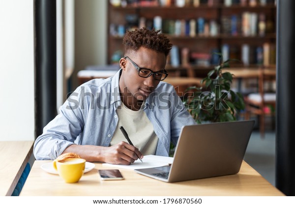 Serious Black Guy Taking Notes While Stock Photo 1796870560 | Shutterstock