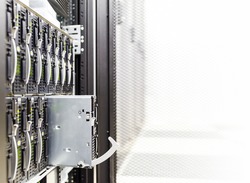 rack with blade behind bars mainframe in the data center, a Technology ...
