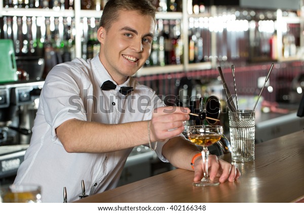 Serving Drinks Positive Smiling Bartender Mixing Stock Photo 402166348 ...