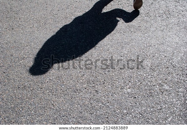 Shadow Man Walking Stock Photo 2124883889 | Shutterstock