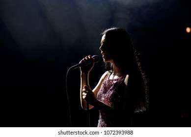 Стоковая фотография 1094066288: Shadow Singer Light | Shutterstock