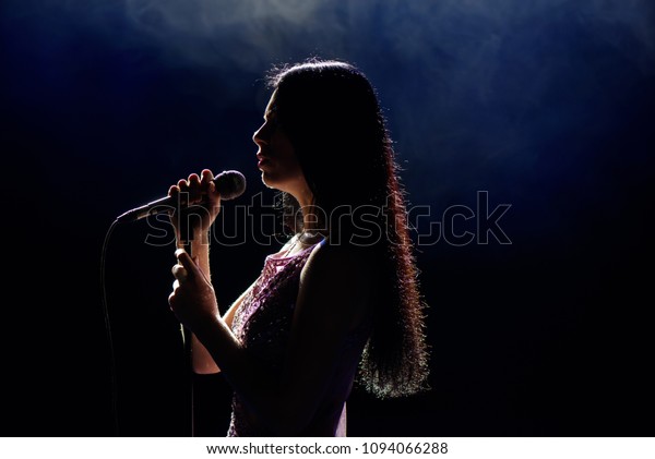 Стоковая фотография 1094066288: Shadow Singer Light | Shutterstock
