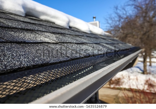Shallow Focus On Mesh Gutter Shingles Stock Photo 1635526879 | Shutterstock