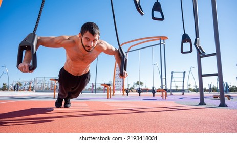 Shirtless Man Doing Loop Exercises Outdoors Stock Photo 2193418031 ...