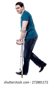 Photo de stock Side Pose Casual Man Walking Crutches 272881172 ...