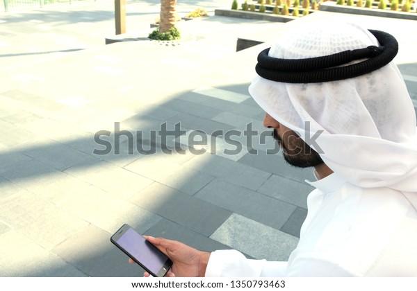 Side View Arab Man Using Smart Stock Photo (Edit Now) 1350793463