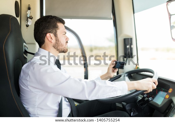 Side View Hispanic Bus Driver Mobile Stock Photo (Edit Now) 1405755254