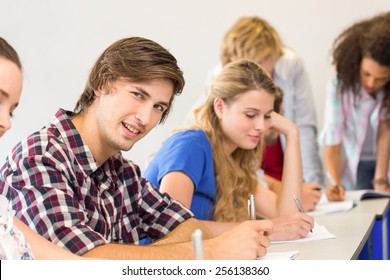 Side View Students Writing Notes Classroom Stock Photo 256138360 ...