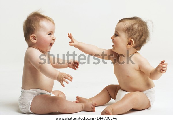 Side View Two Babies Playing On Stock Photo (Edit Now) 144900346