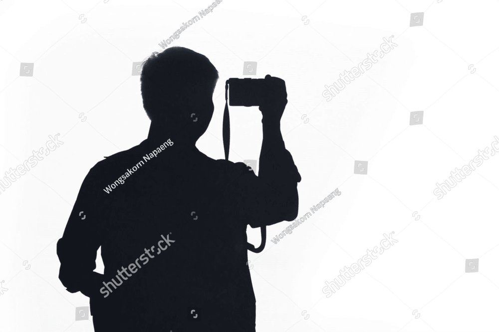 Silhouette man pose using camera. Silhouette man takes photo with ...