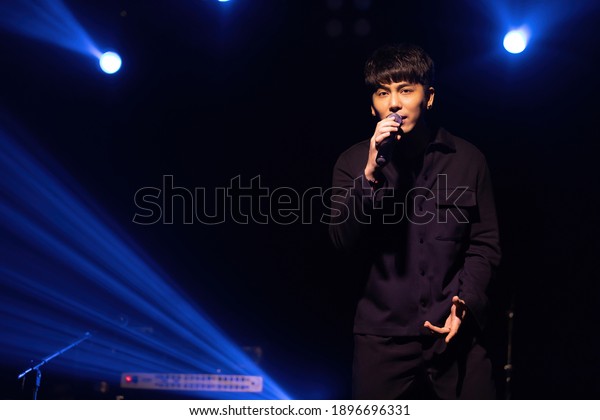 Singer Man Posing Singing On Stage Stock Photo (Edit Now) 1896696331