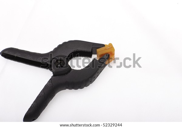 Small Black Plastic Modeling Clamp Orange Stock Photo 52329244 ...