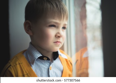 Small Boy Thinking About Something Stock Photo (Edit Now) 561504649
