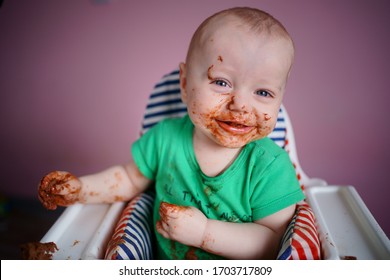 Baby eating with his hands Images, Stock Photos & Vectors | Shutterstock