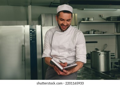 Smiling Chef Uniform Making Notes Notebook Stock Photo 2201165933 ...