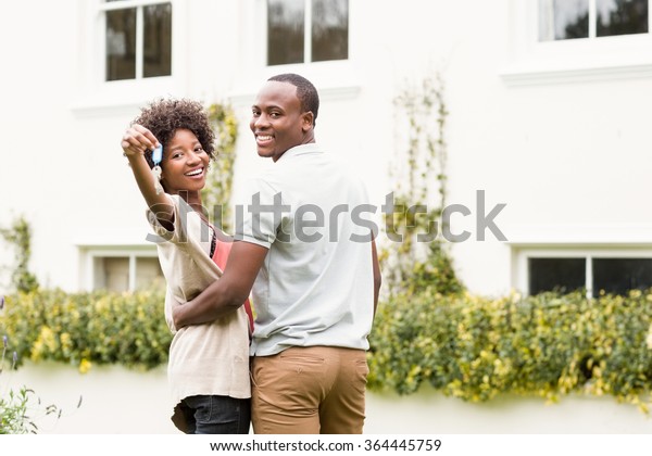 Smiling Couple Looking Back Camera While Stock Photo 364445759 ...