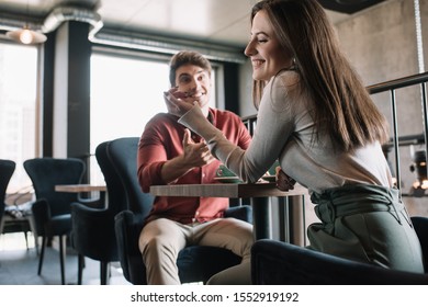 Smiling Couple Talking While Drinking Coffee Stock Photo 1552919192 ...