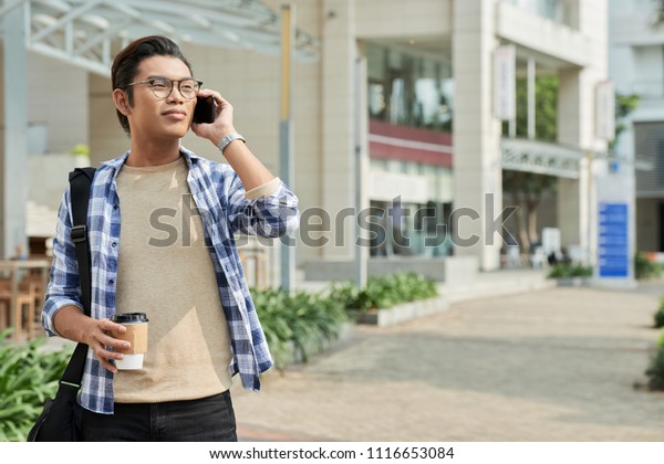 Smiling Filipino Young Man Talking On Stock Photo 1116653084 | Shutterstock Smiling Filipino Young Man Talking On Stock Photo 1116653084 | Shutterstock
