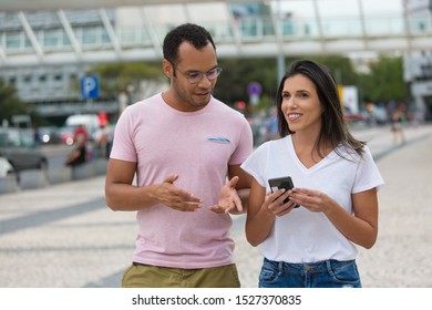 Smiling Friends Talking While Looking Smartphone Stock Photo 1527370835 ...