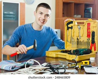 Smiling Guy Doing Something Working Tools Stock Photo (Edit Now) 248465809