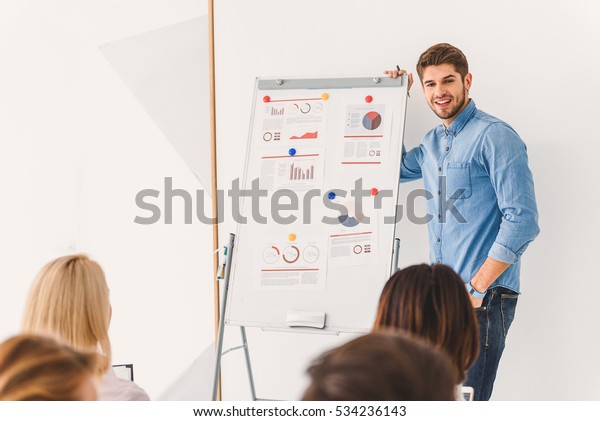 Smiling Guy Presenting Important Information Stock Photo 534236143 ...
