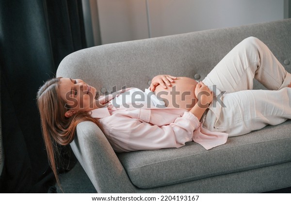 Smiling Laying Down On Sofa Beautiful Stock Photo 2204193167 | Shutterstock