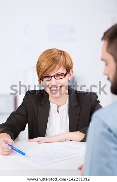 Smiling Receptionist Explaining Document Customer Office Stock Photo ...