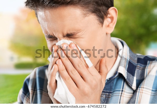 Sneezing Stock Photo (Edit Now) 674582272