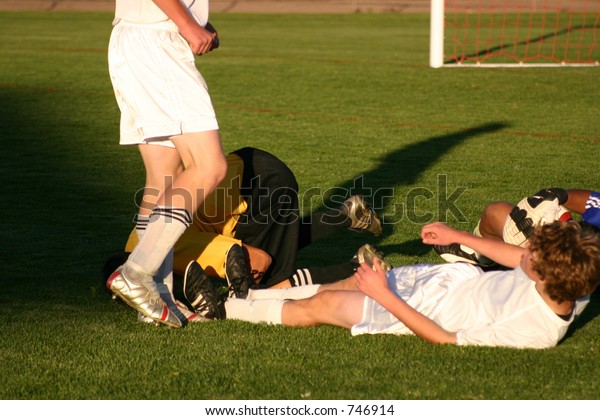 Soccer Players Collide While Trying Score Stock Photo (Edit Now) 746914