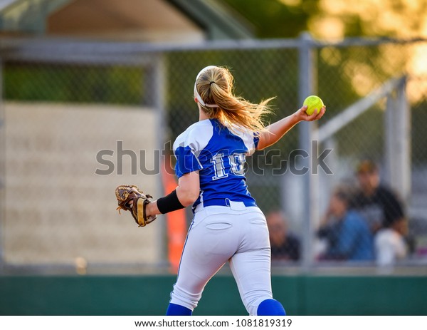 Softball Pitcher Throwing First Base Player Stock Photo (Edit Now ...