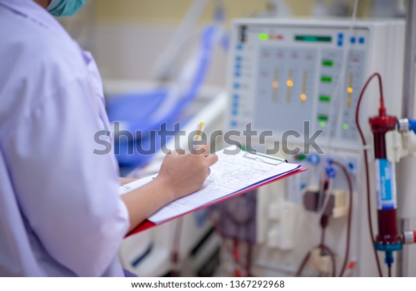 Specialist Checking Continuous Renal Replacement Therapy Stock Photo ...